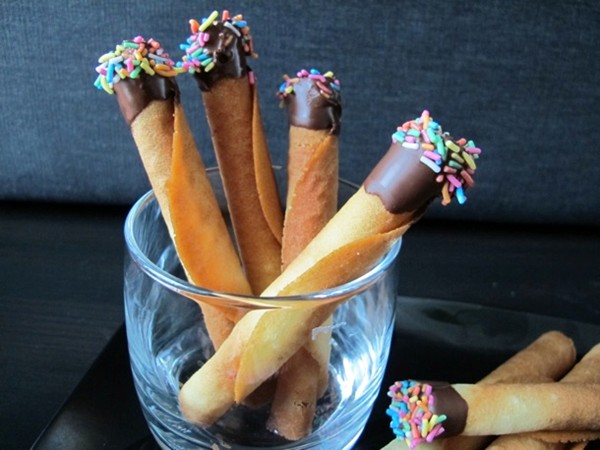 Chocolate dipped tuile "cigarettes" recipe | Eat Your Books