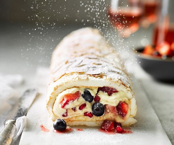 Pavlova roll with marinated berries & spiced cream recipe | Eat Your Books