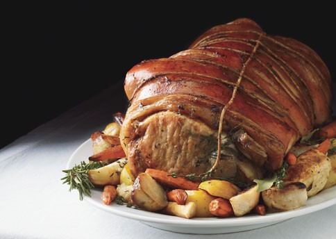 Roast pork loin and root vegetables with cracklings and Italian-style ...